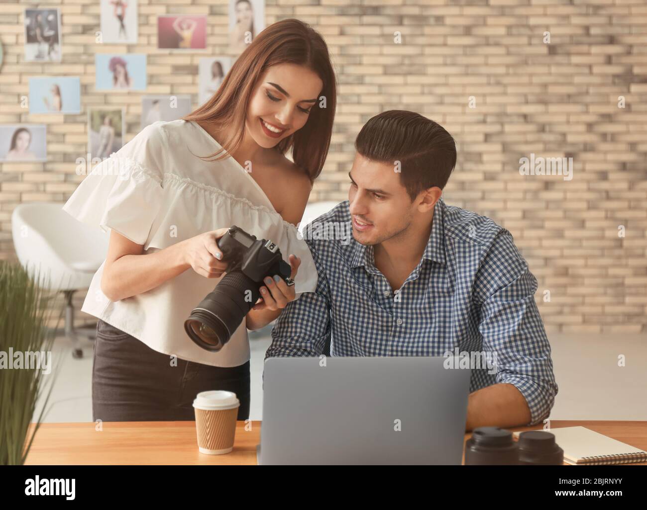 Two young photographers working hi-res stock photography and images - Alamy