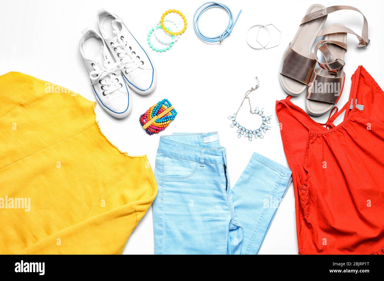 Stylish set of casual female clothes on white background Stock Photo ...