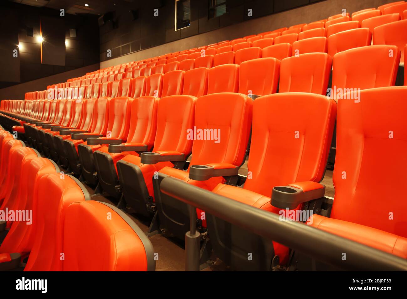 Empty cinema with comfortable chairs Stock Photo - Alamy