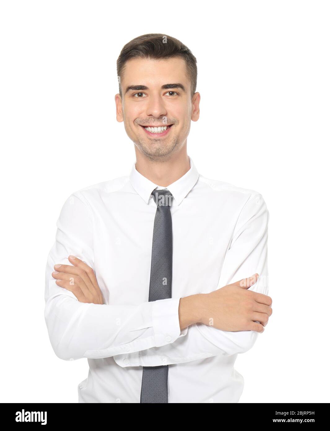 Attractive young man in formal wear on white background Stock Photo - Alamy
