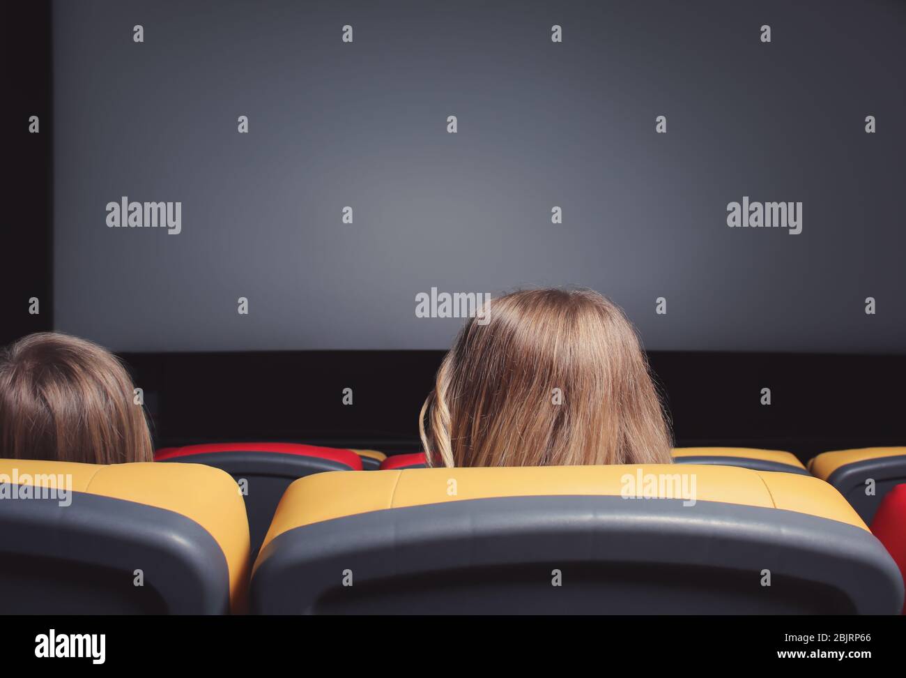 People watching movie in cinema Stock Photo - Alamy