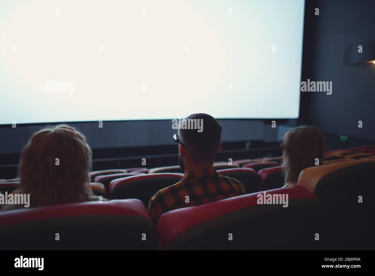 People watching movie in cinema Stock Photo - Alamy