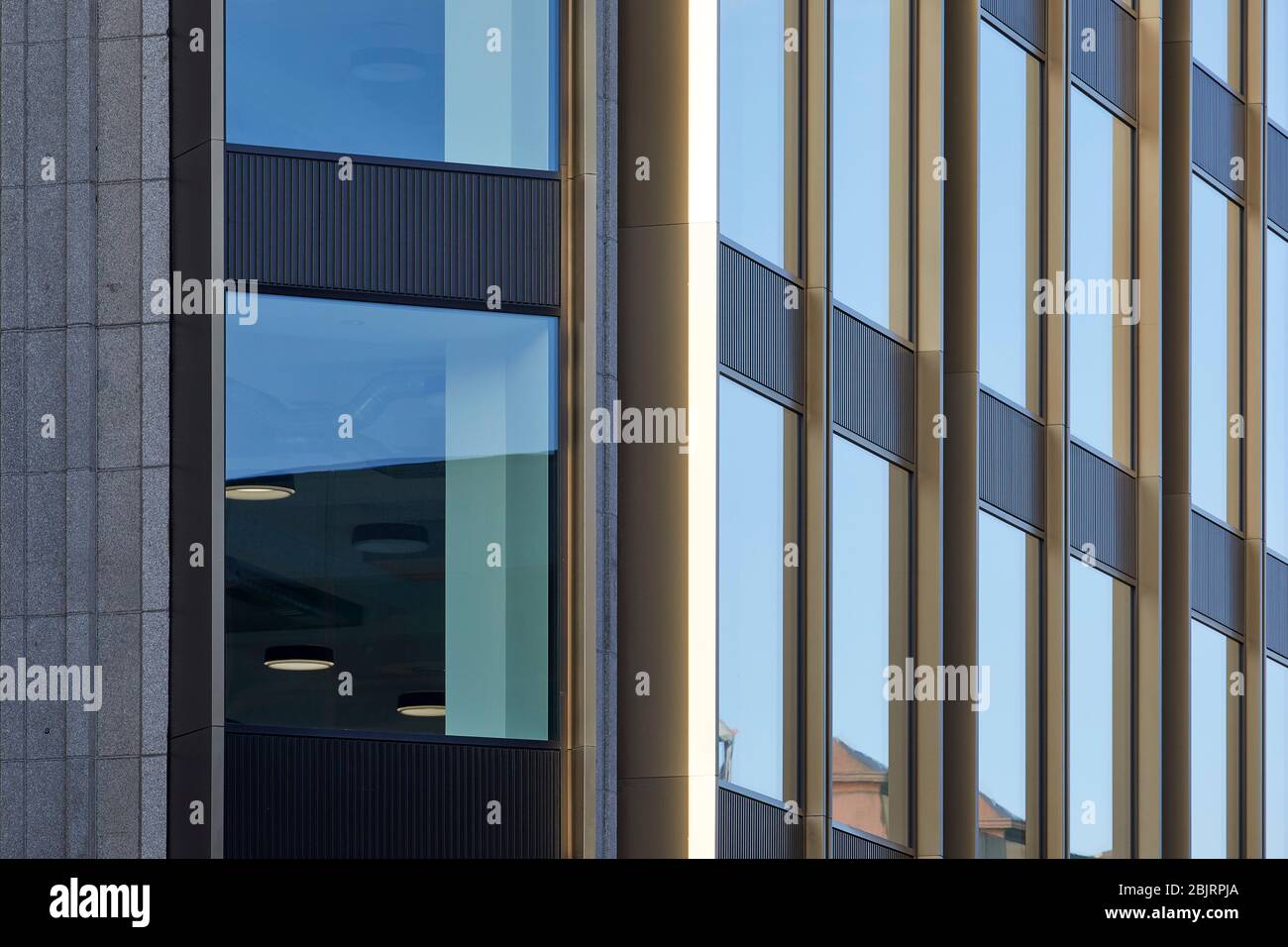 Detail of metal bronze anodized cladding around the windows. 75 ...