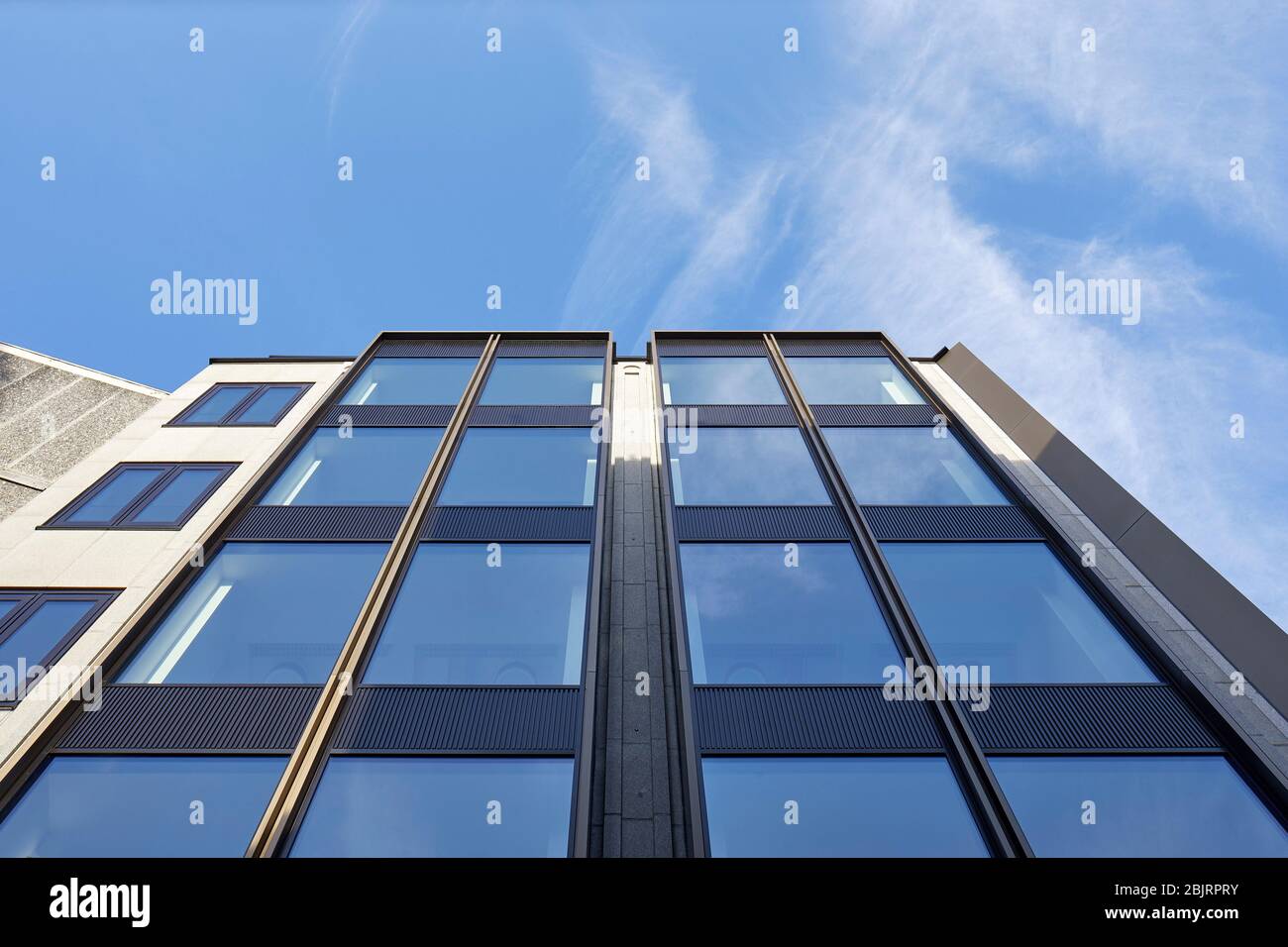 Detail of metal bronze anodized cladding around the glazing. 75 ...