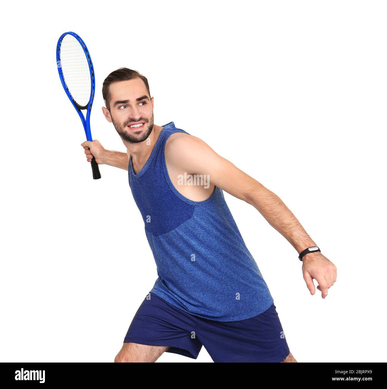 Handsome man with tennis racket on white background Stock Photo - Alamy