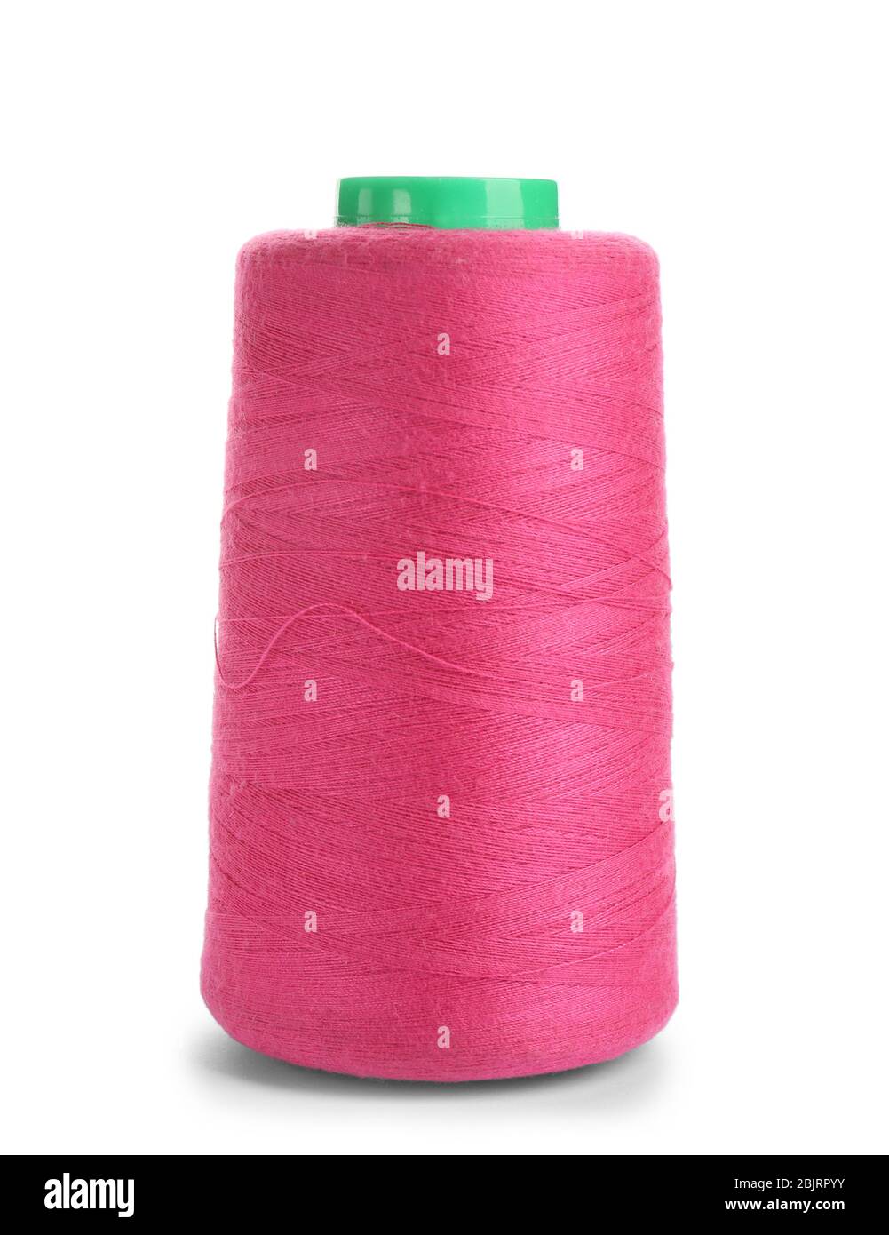 Spool of sewing thread on white background Stock Photo - Alamy