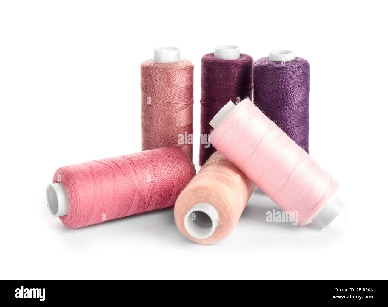 Set of sewing threads on white background Stock Photo - Alamy