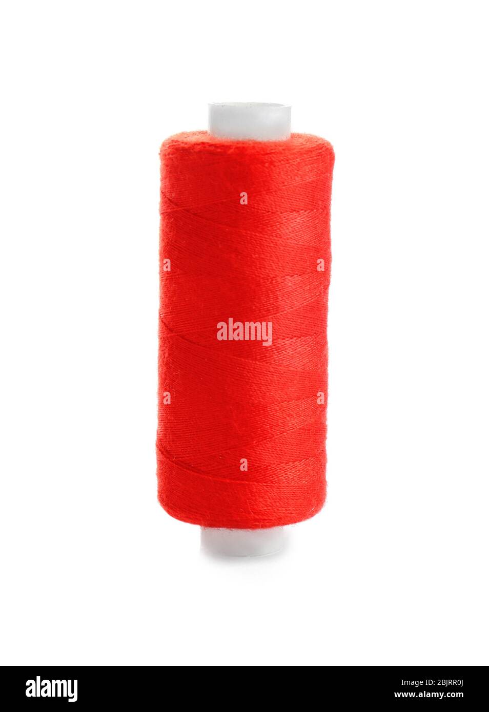 Spool of sewing thread on white background Stock Photo - Alamy