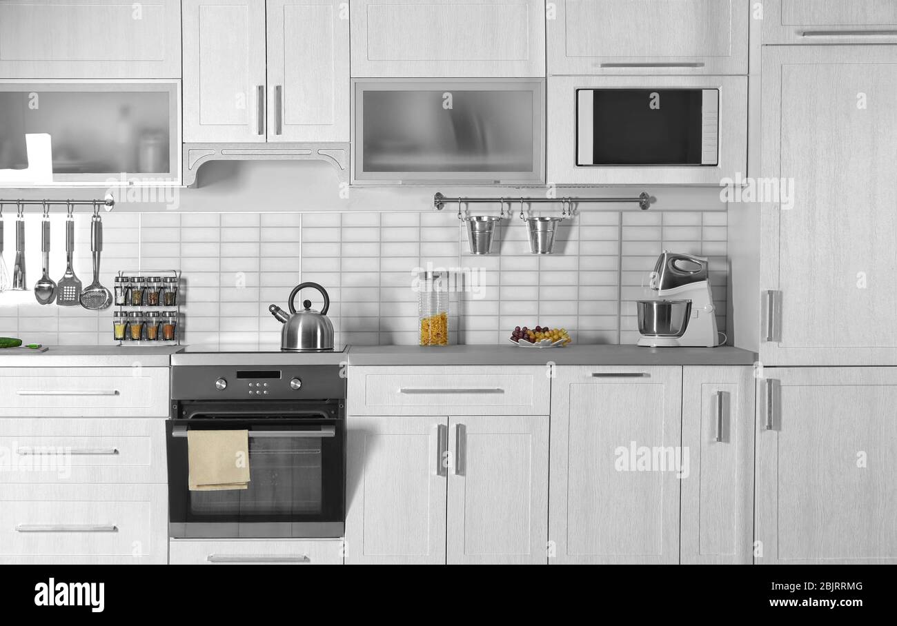 Modern kitchen interior with new oven Stock Photo - Alamy