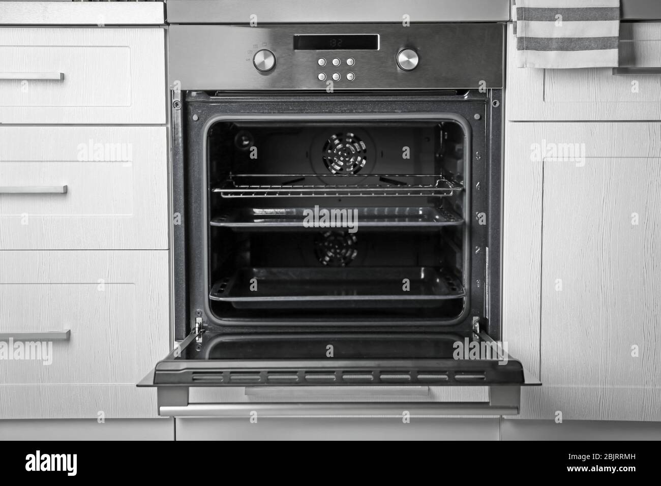 New electric oven in kitchen Stock Photo - Alamy