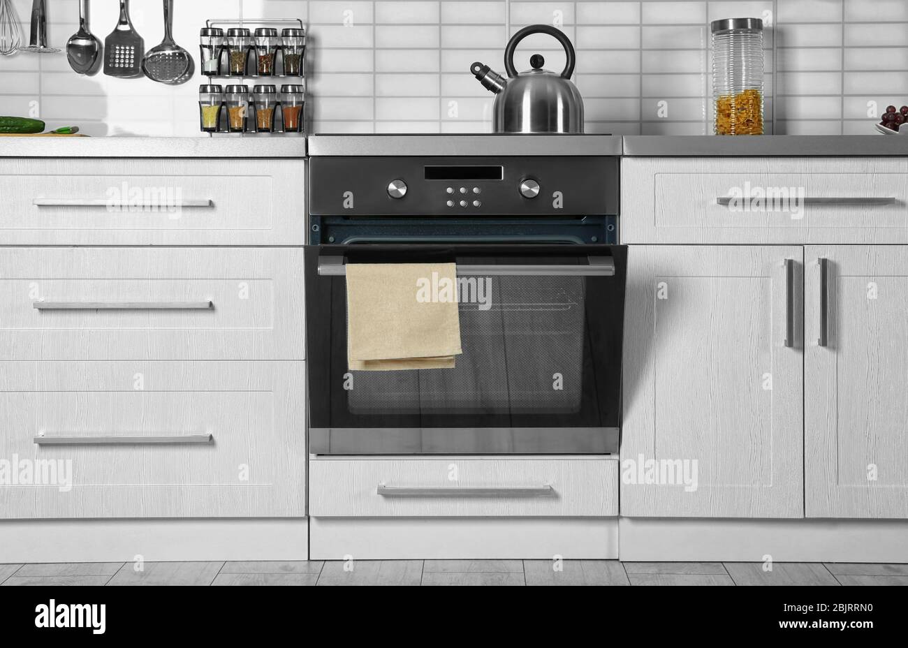 Modern kitchen interior with new oven Stock Photo - Alamy