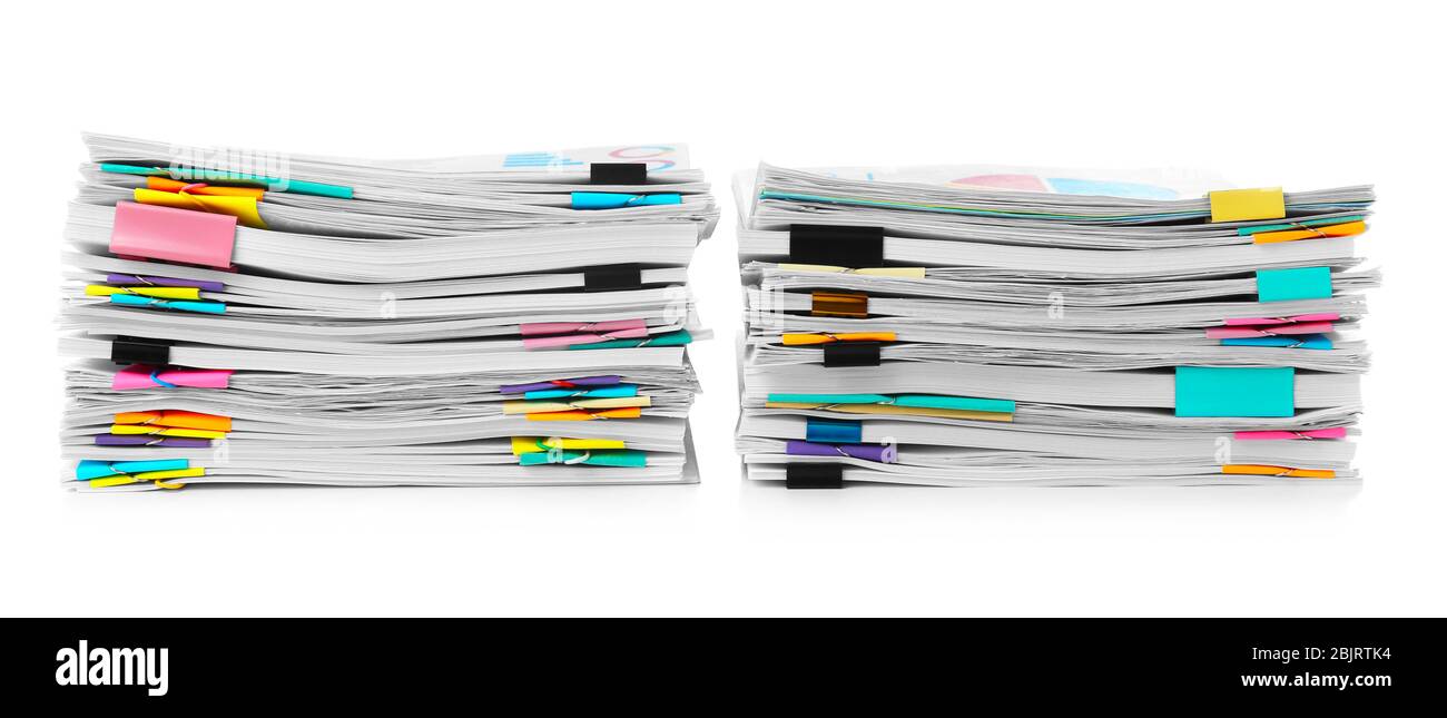 Stacks of documents on white background Stock Photo - Alamy