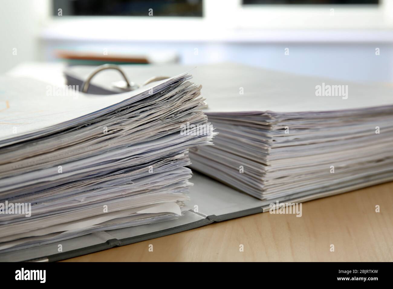 Folder with documents on table Stock Photo - Alamy