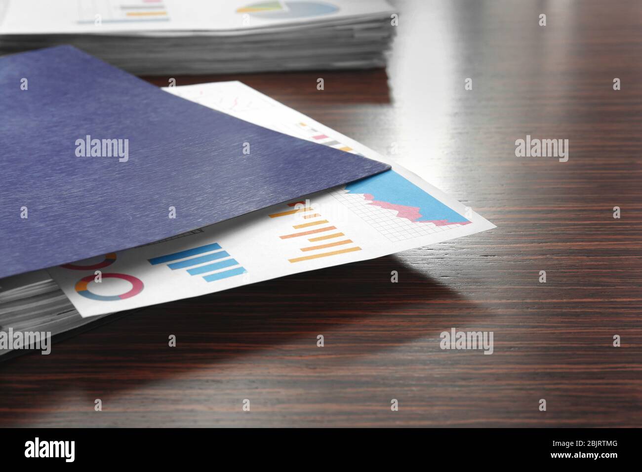Folder with documents on table Stock Photo - Alamy