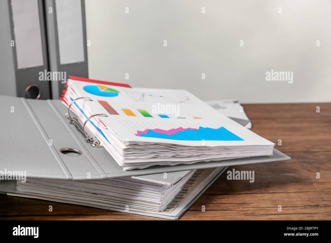 Many folders on table hi-res stock photography and images - Alamy