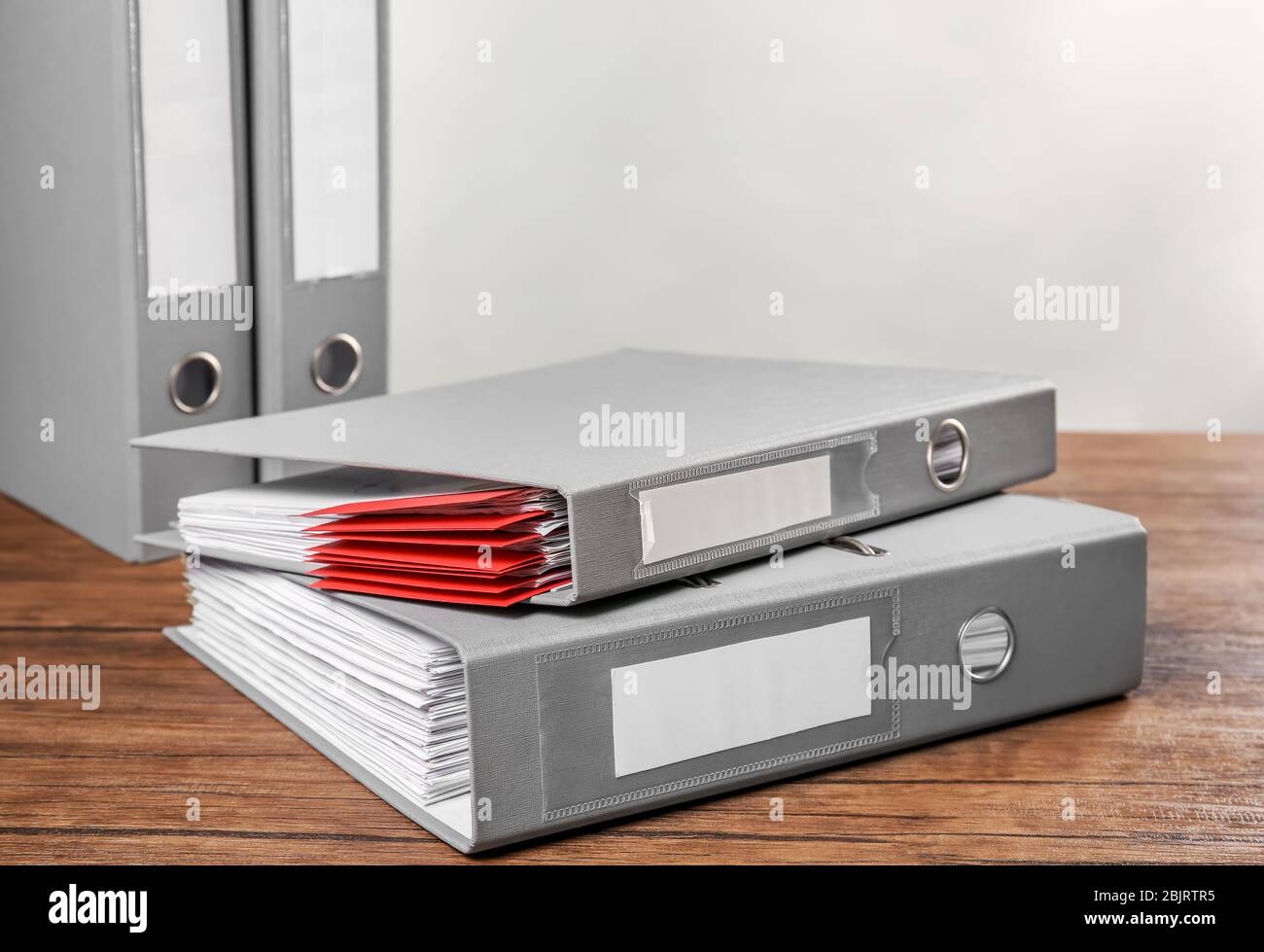 Folders with documents on table Stock Photo - Alamy