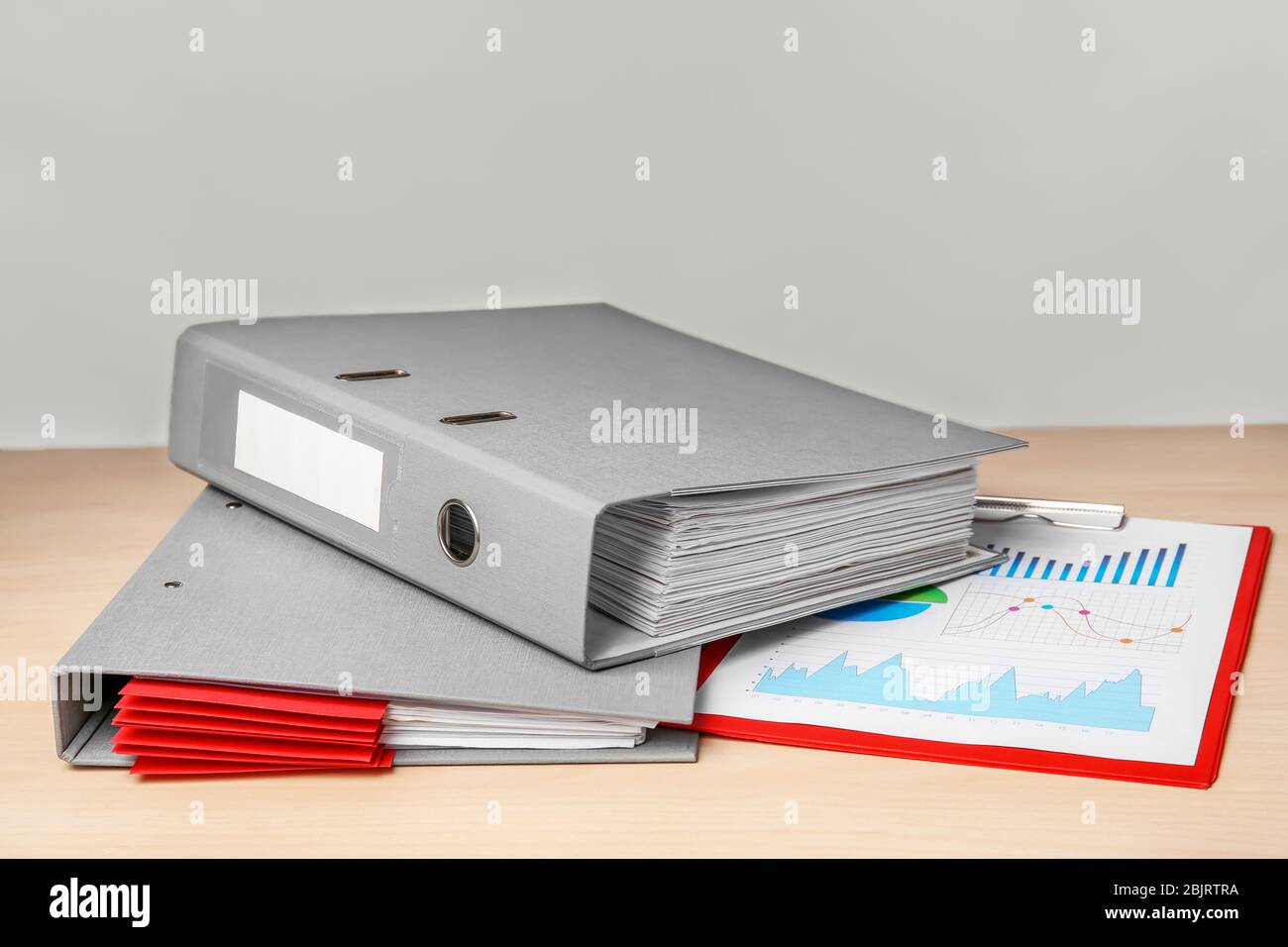 Folders with documents on table Stock Photo - Alamy