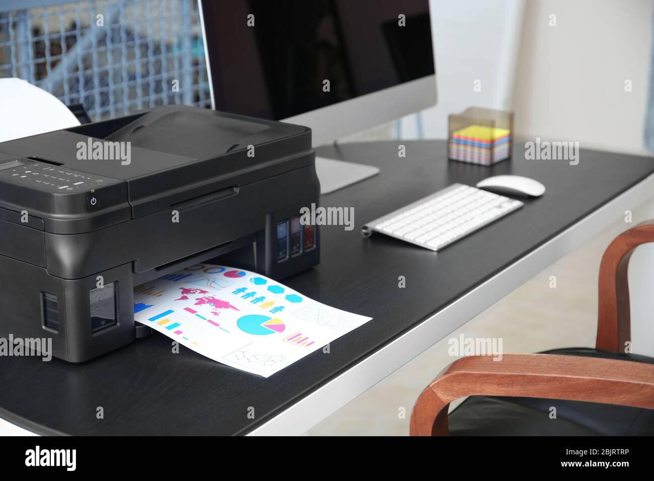 Printing document with diagrams in office, closeup Stock Photo - Alamy