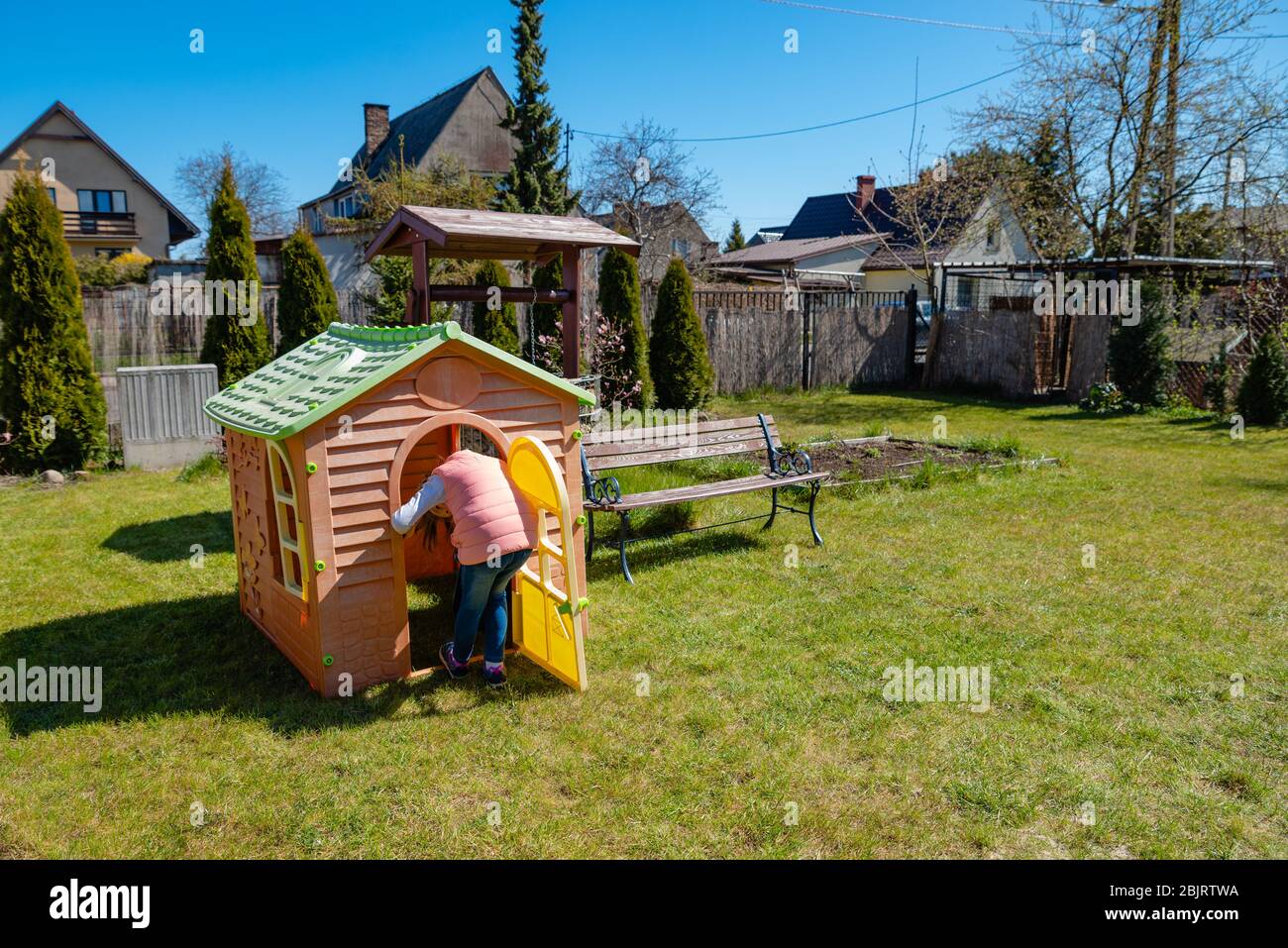 A plastic house for children to play in the garden Stock Photo - Alamy