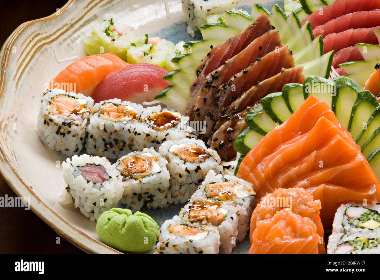 typical Japanese food in decorated and colorful dishes, Sushi and ...
