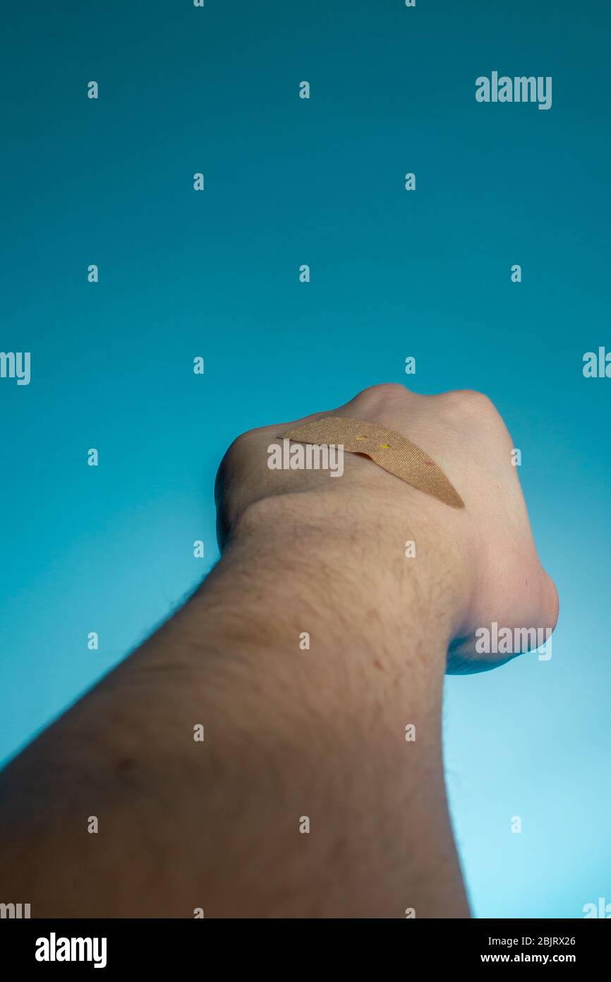 Finger plaster blue hi-res stock photography and images - Alamy