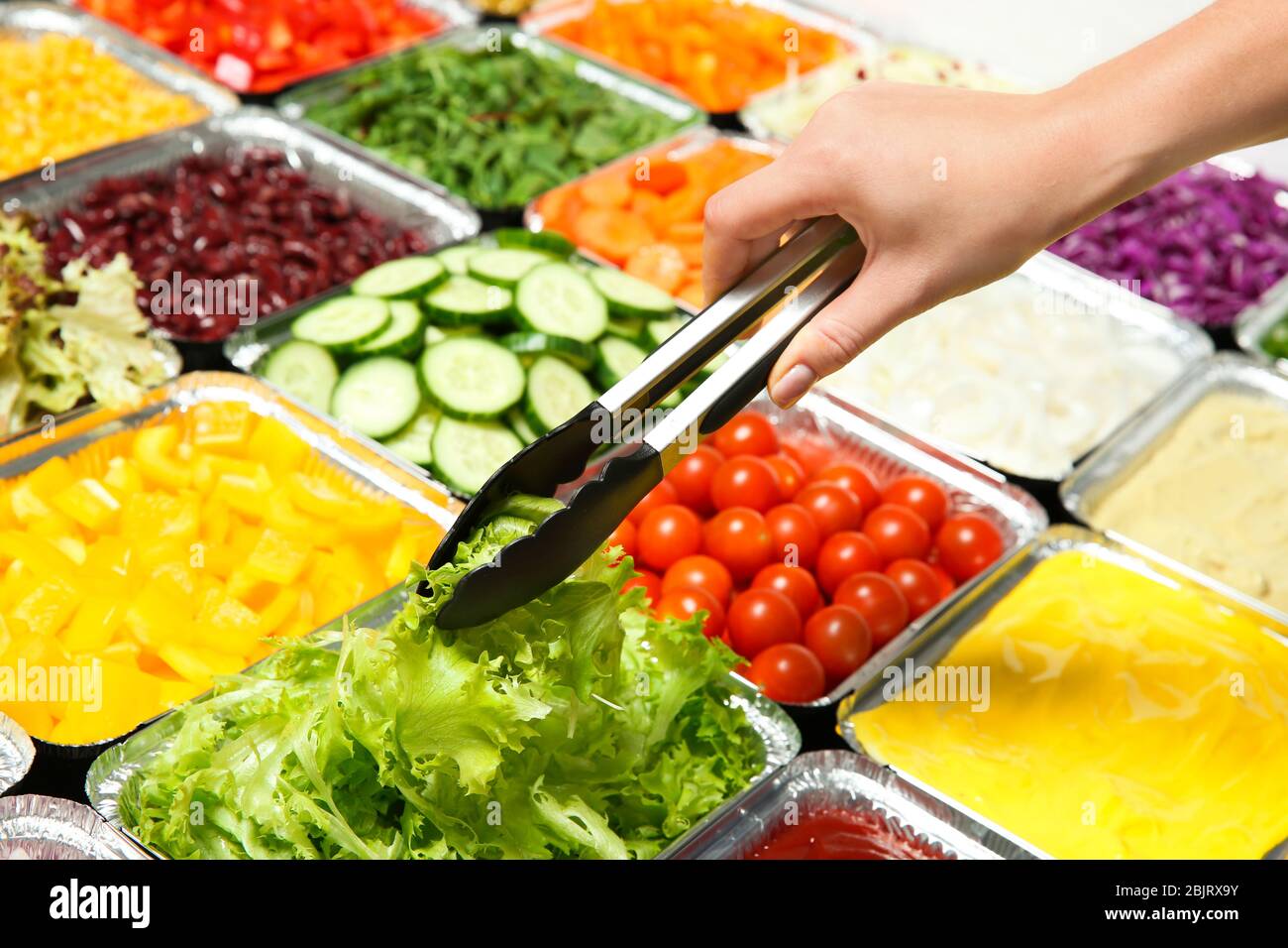Close up woman taking salad hi-res stock photography and images - Alamy