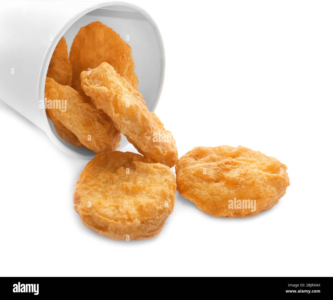 Paper cup with tasty chicken nuggets on white background Stock Photo ...