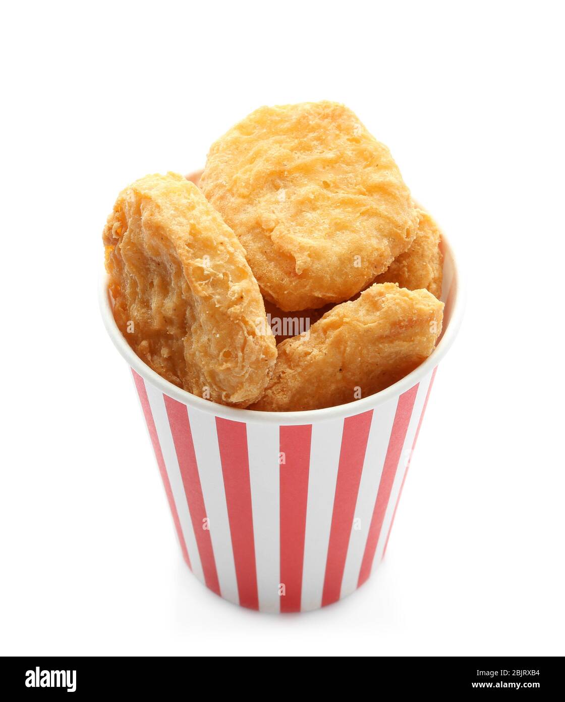 Paper cup with tasty chicken nuggets on white background Stock Photo ...