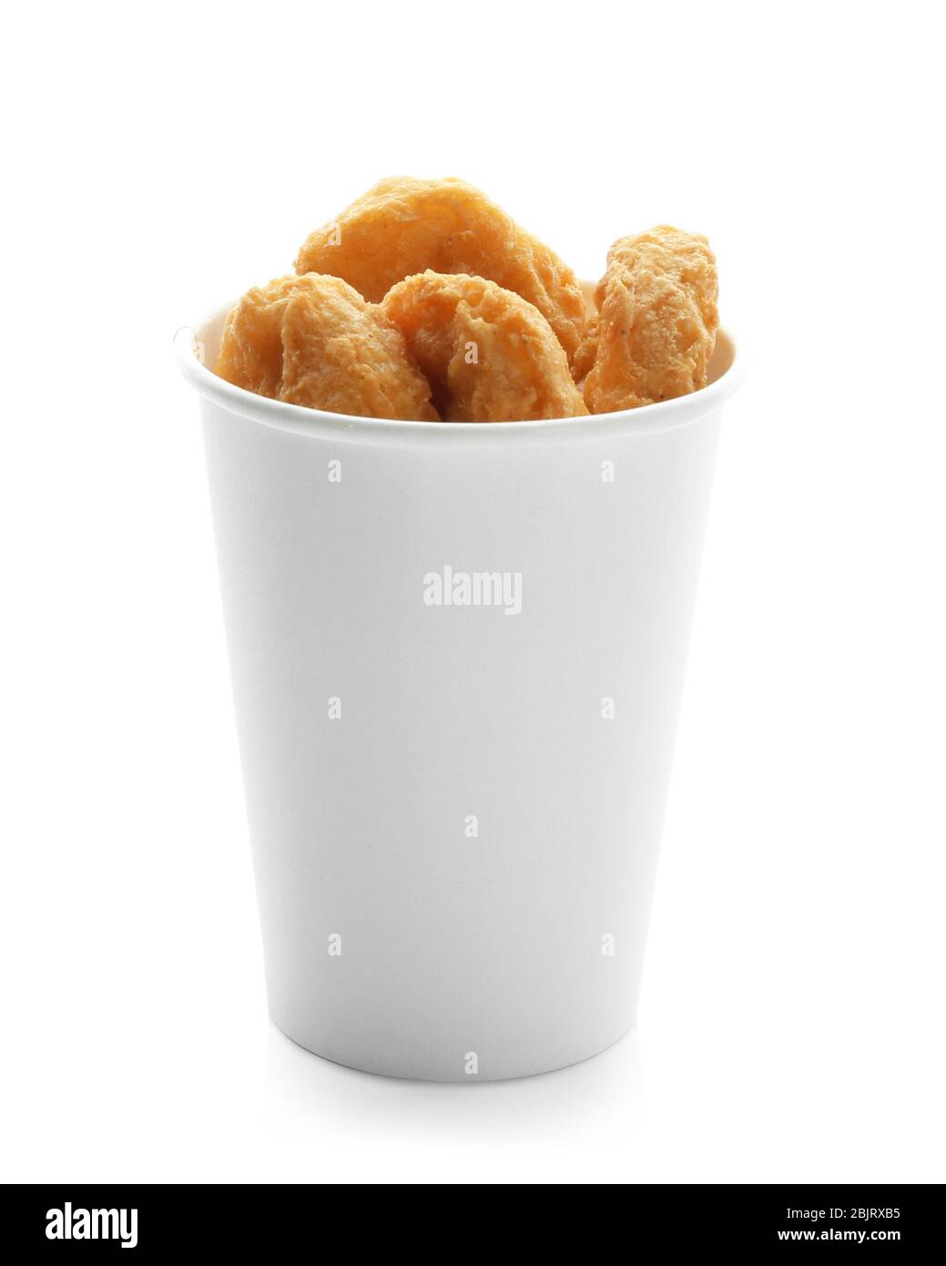 Paper cup with tasty chicken nuggets on white background Stock Photo ...