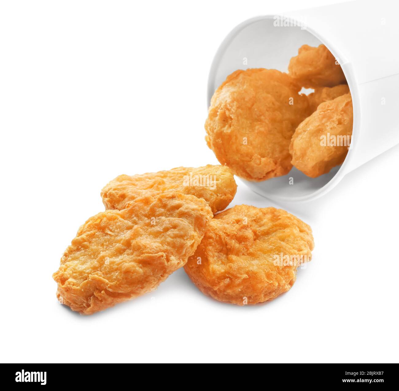 Paper cup with tasty chicken nuggets on white background Stock Photo ...