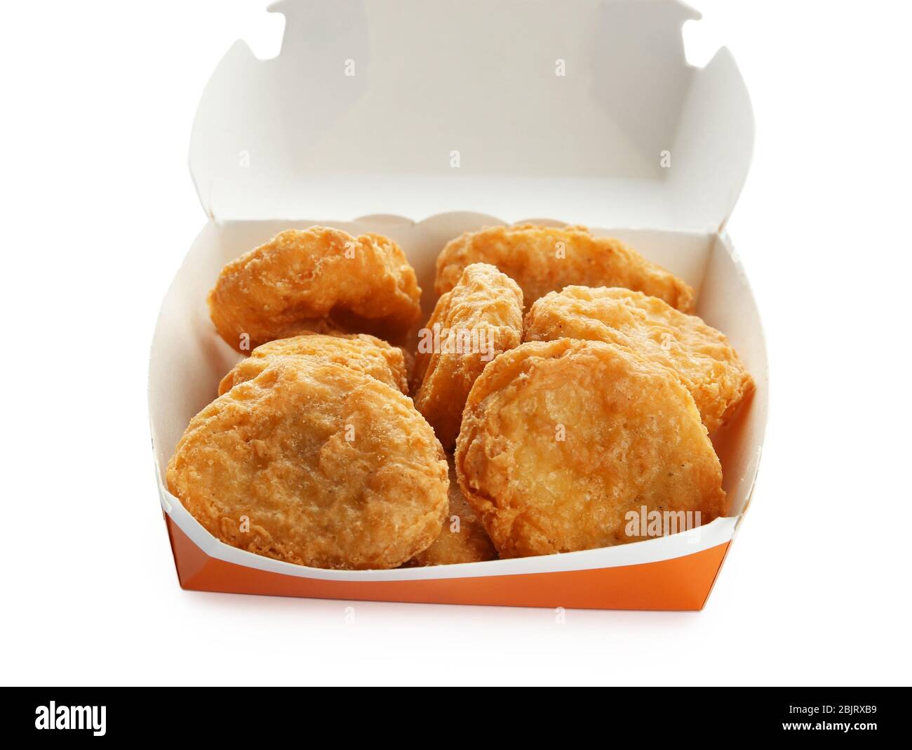 Box with tasty chicken nuggets on white background Stock Photo - Alamy