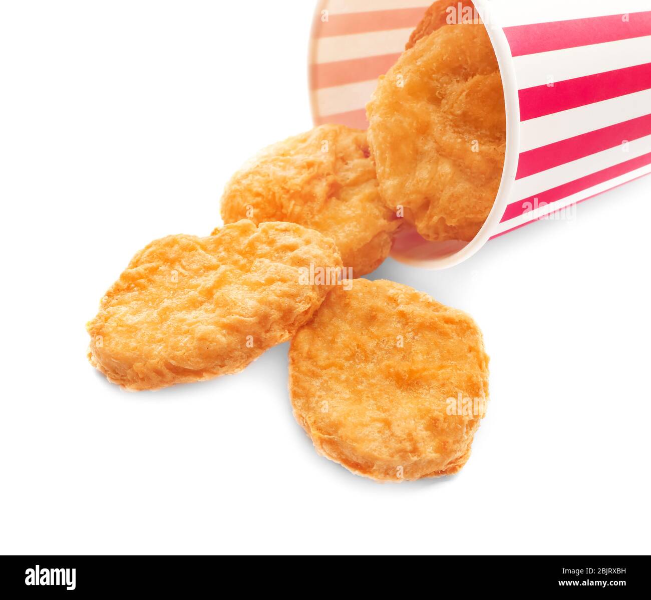 Paper cup with tasty chicken nuggets on white background Stock Photo ...