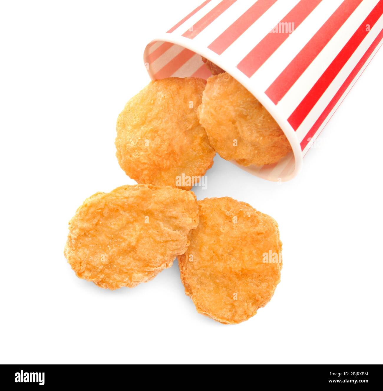 Paper cup with tasty chicken nuggets on white background Stock Photo ...