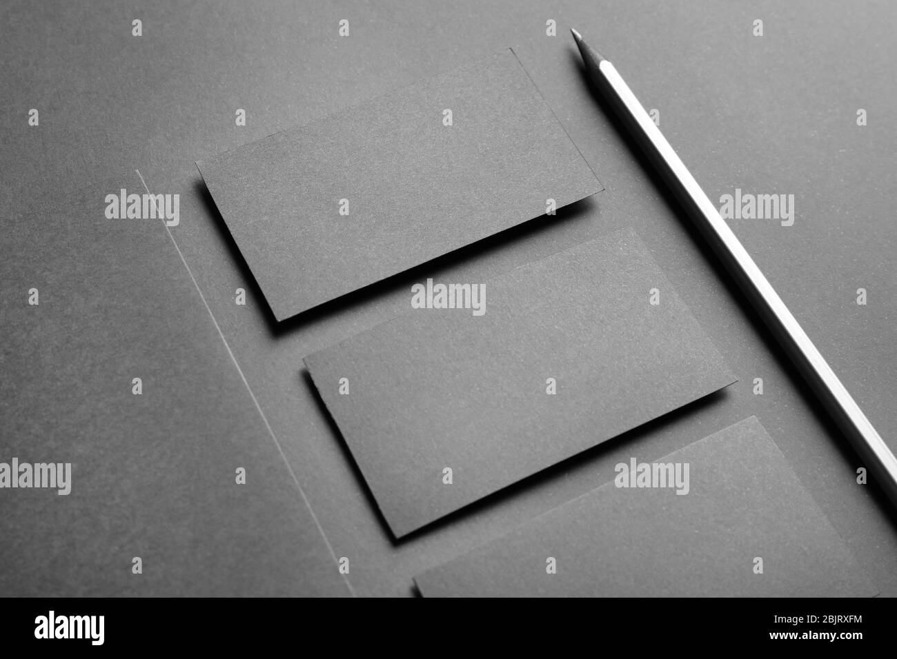 Blank items as mockups for branding on dark background Stock Photo - Alamy