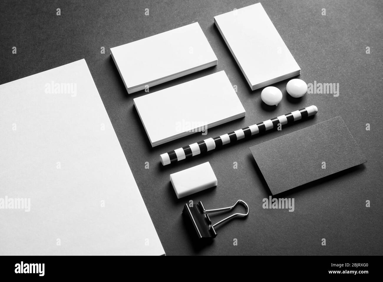 Blank items as mockups for branding on dark background Stock Photo - Alamy