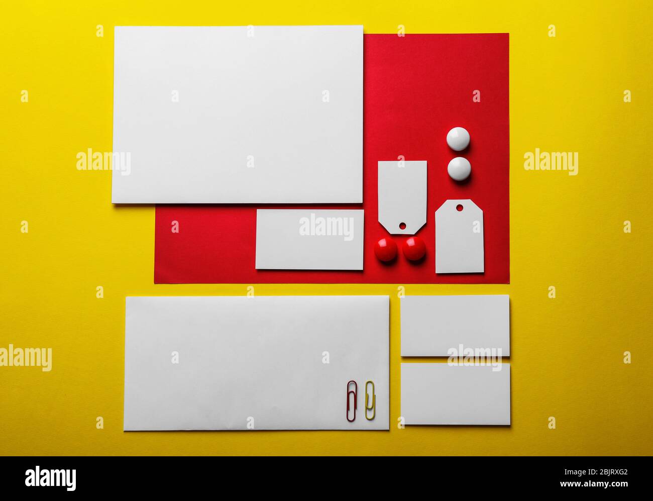 Blank items as mockups for branding on color background Stock Photo - Alamy