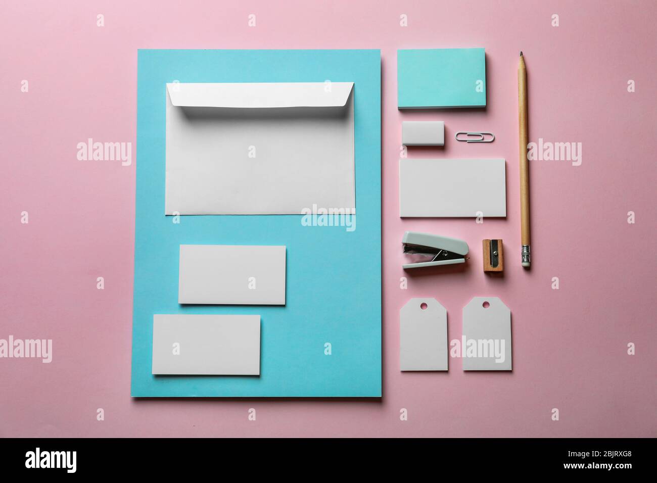 Blank items as mockups for branding on color background Stock Photo - Alamy