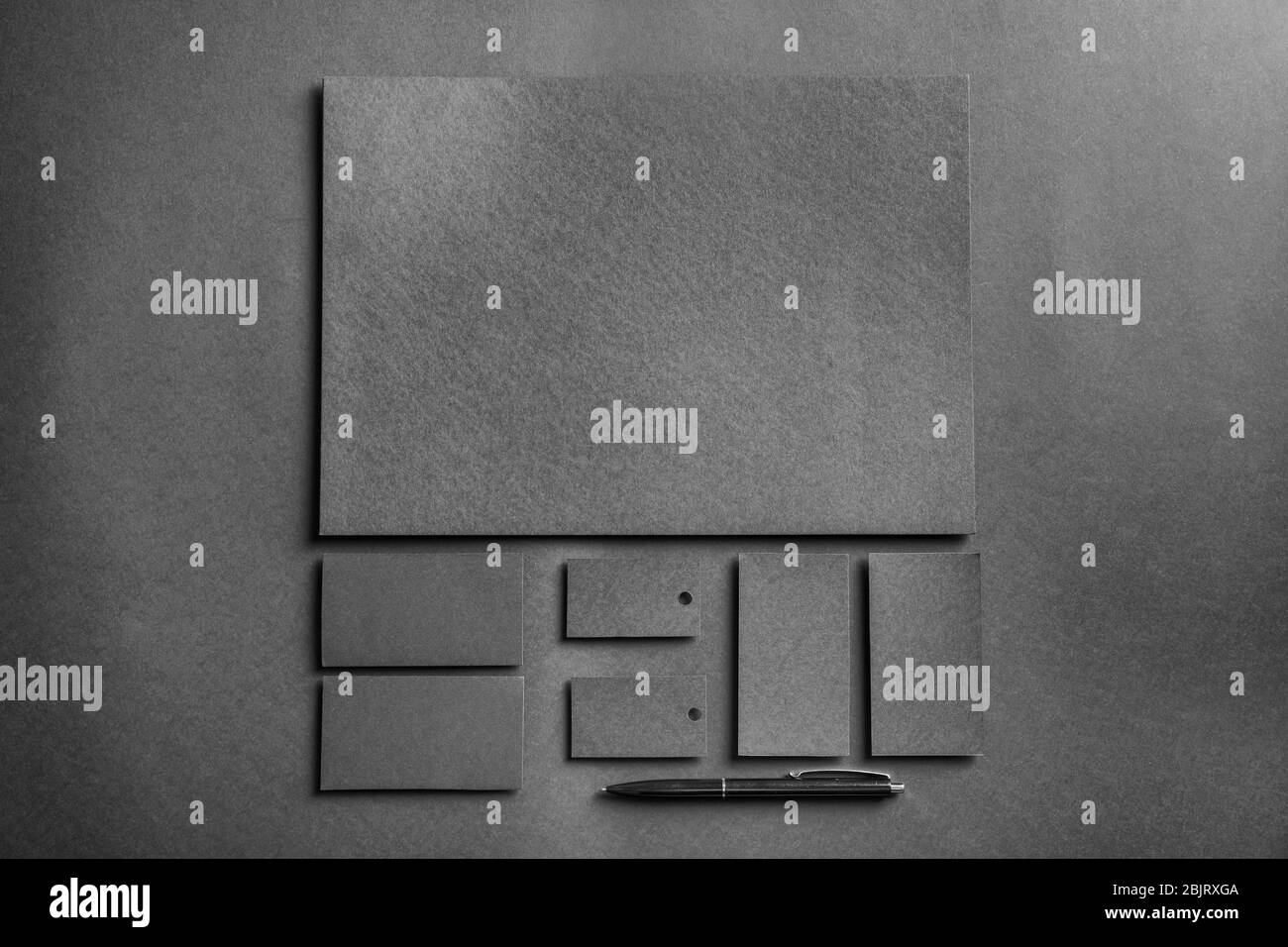 Blank items as mockups for branding on dark background Stock Photo - Alamy