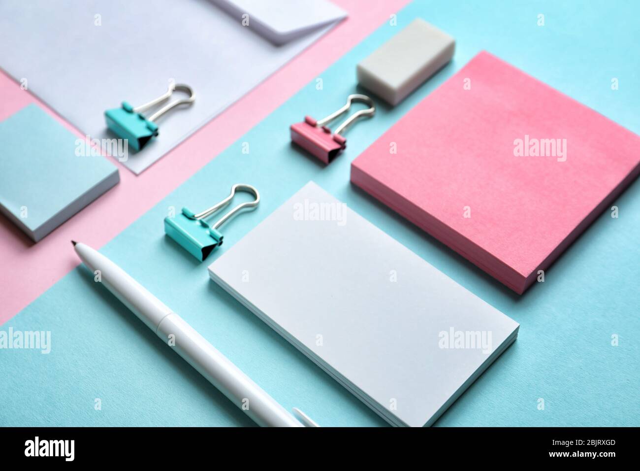 Blank items as mockups for branding on color background Stock Photo - Alamy