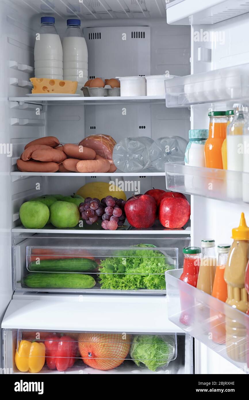 Refrigerator full of food Stock Photo - Alamy