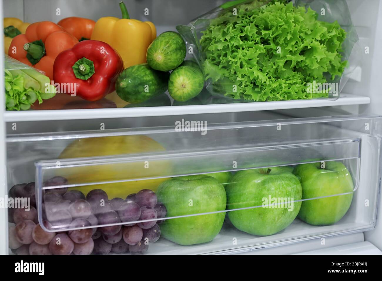 Fresh vegetables and fruits in refrigerator Stock Photo - Alamy