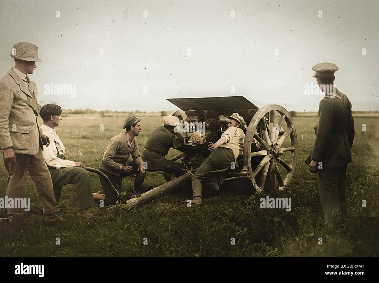 Group of Irish Free State Army soldiers grouped behind heavy field ...