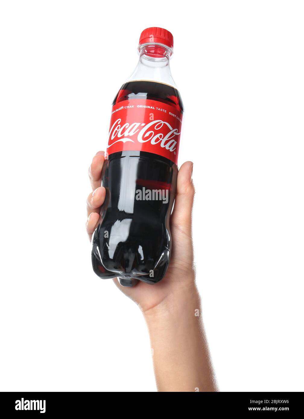 Hand holding coca cola bottle hi-res stock photography and images - Alamy