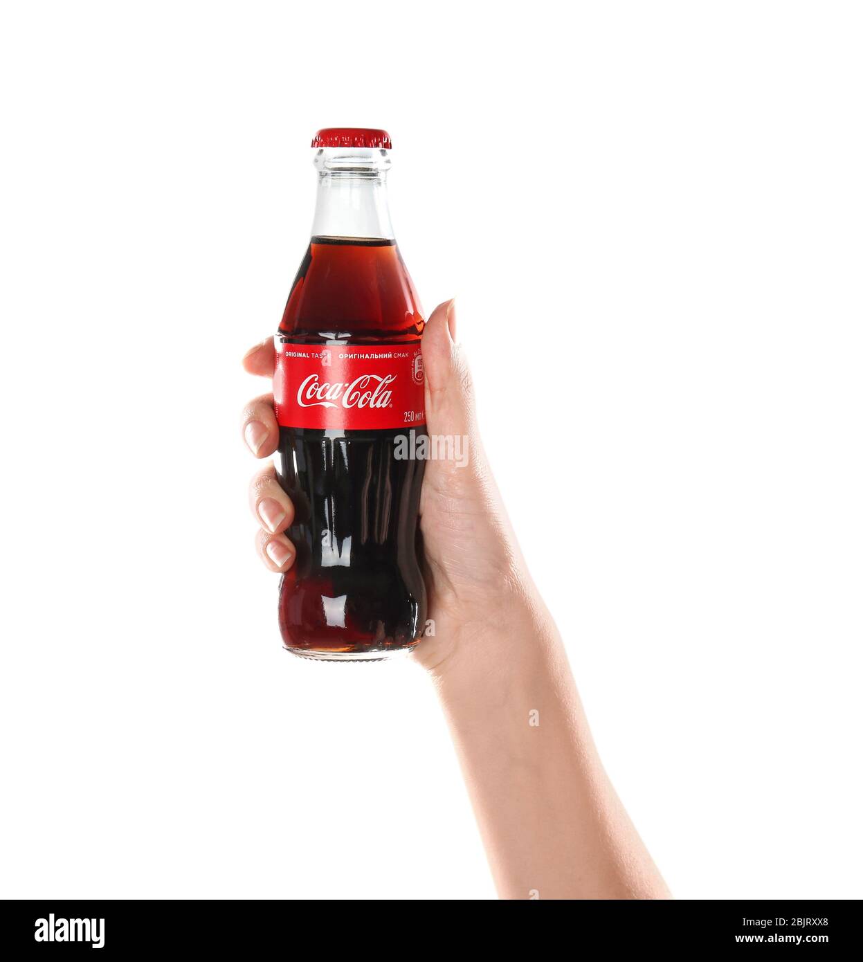 Hand holding coca cola bottle hi-res stock photography and images - Alamy