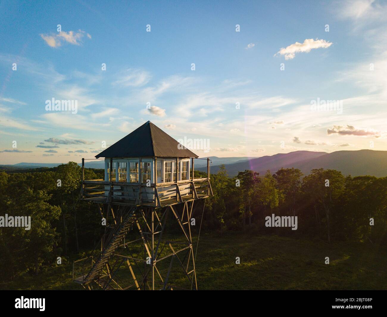 The Thorny Mountain fire tower faces a morning view of the mountains ...