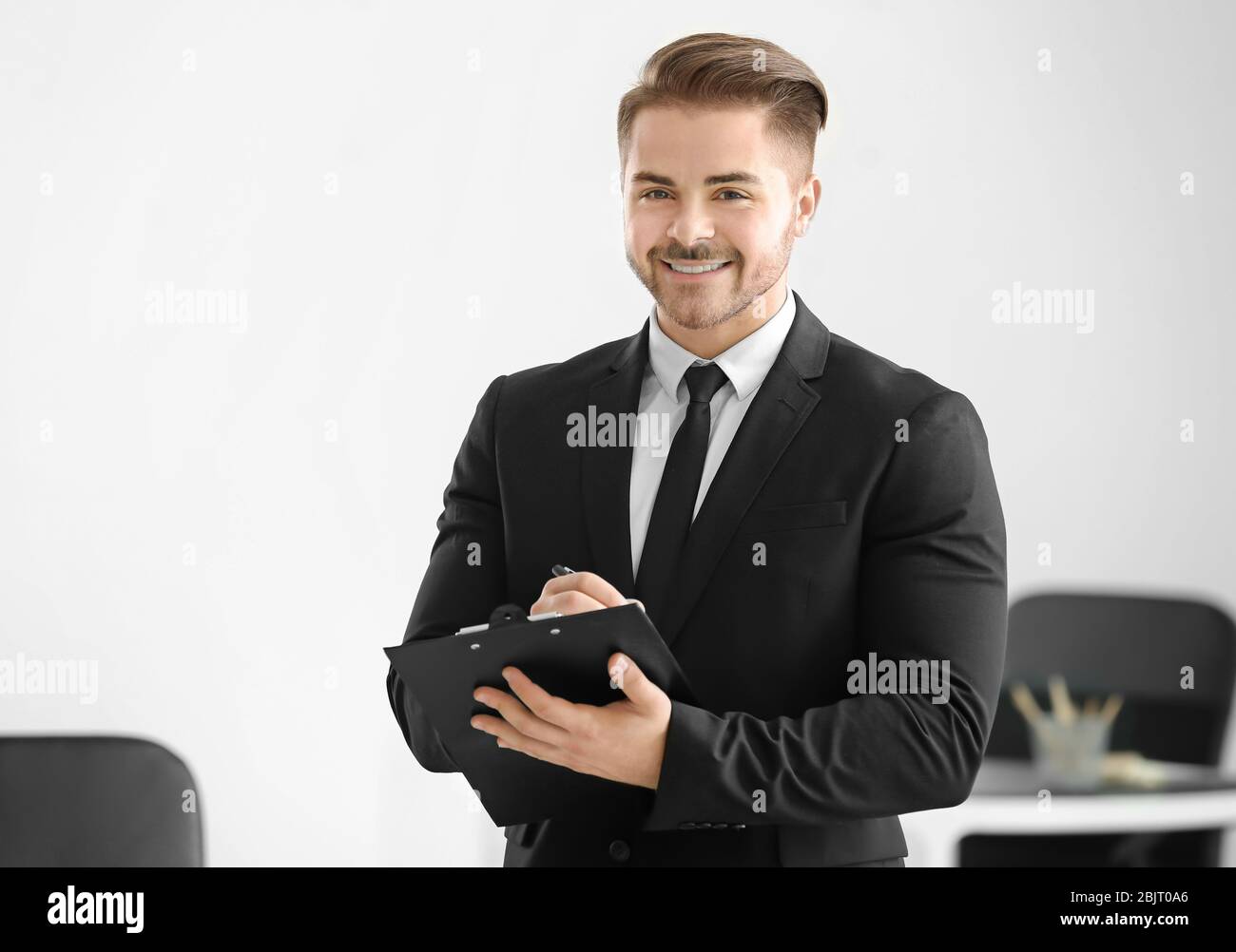 Attractive young lawyer in office Stock Photo - Alamy