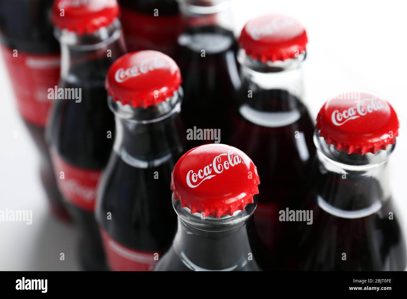 KYIV, UKRAINE - NOVEMBER 14, 2017: Many bottles of Coca-Cola, closeup ...