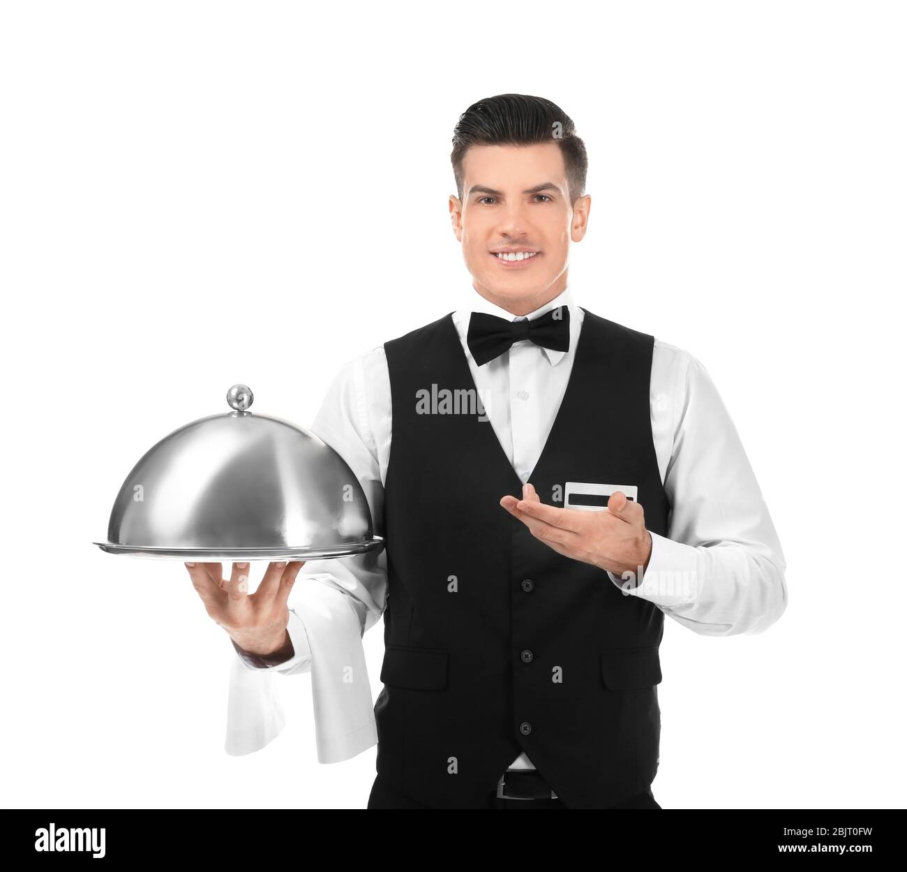 Waiter with metal tray and cloche on white background Stock Photo - Alamy