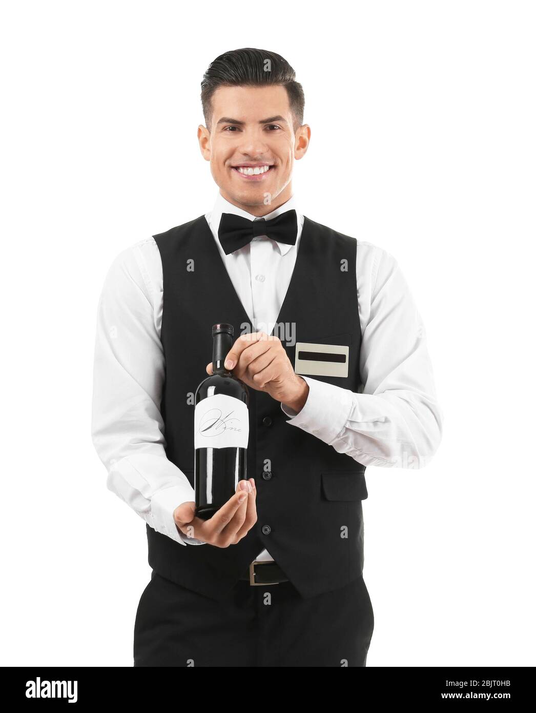 Waiter holding bottle of wine on white background Stock Photo - Alamy