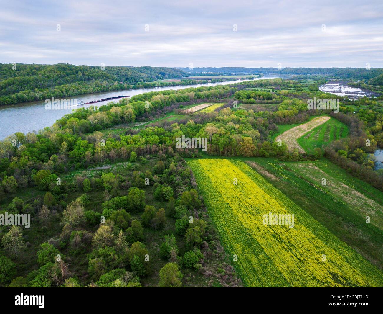 Lush spring greens follow the Ohio River as it snakes between Ohio and ...